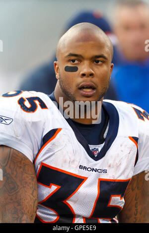 Denver Broncos running back Lance Ball (35) gains ten yards on a pass ...