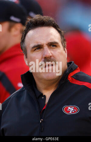San Francisco 49ers defensive line coach Kris Kocurek stands on the ...