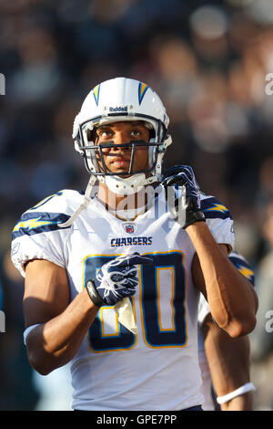 San Diego Chargers' Malcom Floyd (80) is tackled Green Bay Packers' Ha ...