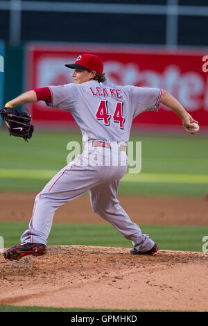 Cincinnati Reds pitcher Mike Leake throws during spring training ...