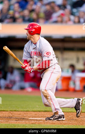 Cincinnati Reds third baseman Scott Rolen (27) sits in the Reds dugout ...