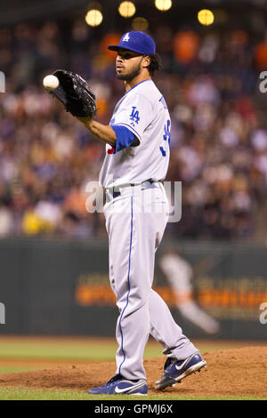 Los Angeles Dodgers relief pitcher Jonathan Hernandez reacts after ...