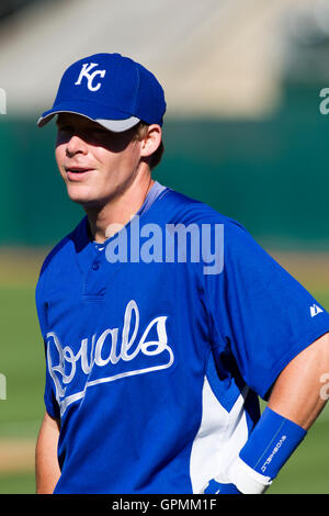 Kansas City Royals second baseman Michael Massey throws to first base ...