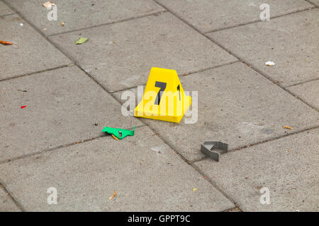 Evidence identification number marker / markers placed by scene of ...