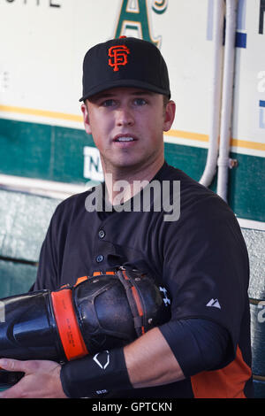 San Francisco Giants' Buster Posey makes contact with the ball during a ...