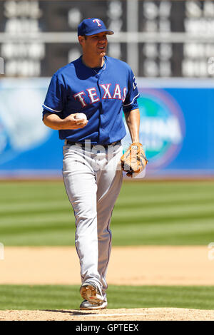 Texas Rangers Colby Lewis #48 throws a pitch in the sixth inning. Colby ...