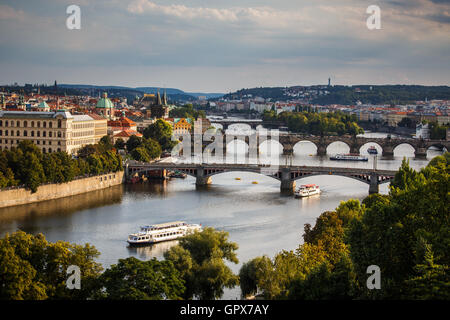 Prague with its splendid bridges over the Vltava river, city sunset ...