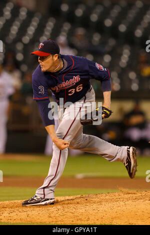Minnesota Twins pitcher Joe Nathan stands in the dugout prior to the ...