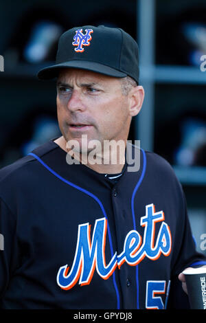 New York Mets third base coach Mike Sarbaugh (88) stands on the field ...