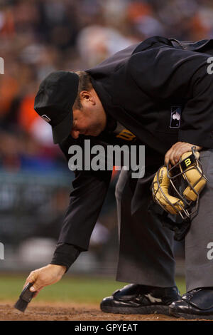 Home plate umpire Sam Holbrook looks on during the second inning of a ...