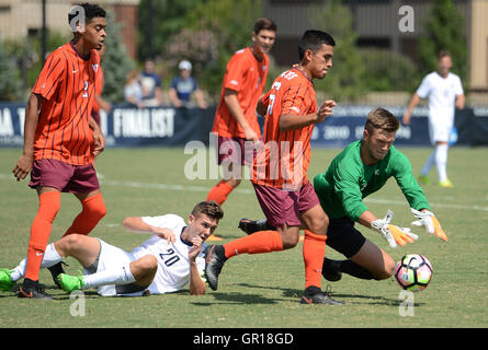 Virginia Tech Hokies guard Ben Hammond (3) dribbles the ball at Cassell ...