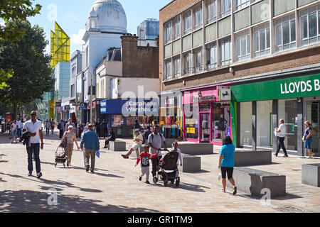 Summer shoppers in Croydon town centre pedestrianised shopping street ...