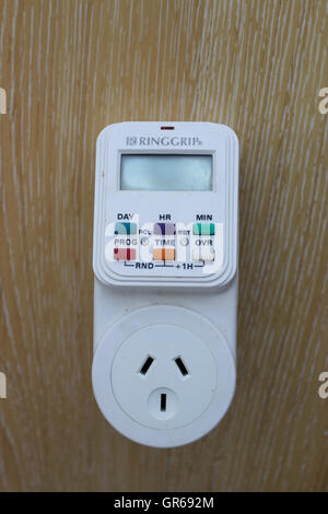 digital electrical wall socket timer on white background Stock Photo ...