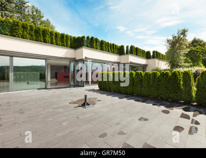 External view of a contemporary house modern villa at sunset Stock ...
