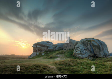 House between the rocks in Meneham village, Kerlouan, Finistere ...