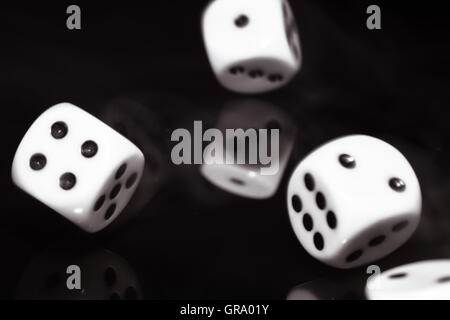 Dice In Motion Stock Photo - Alamy