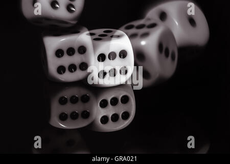 Dice In Motion Stock Photo - Alamy
