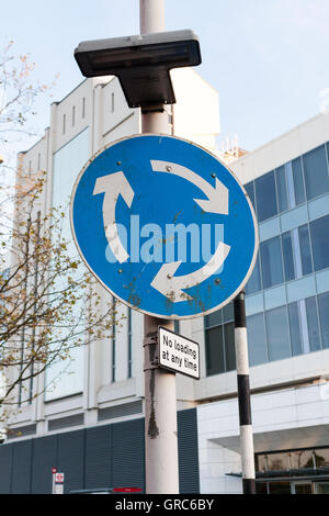 uk road sign roundabout blue white arrows arrow traffic circle turn ...