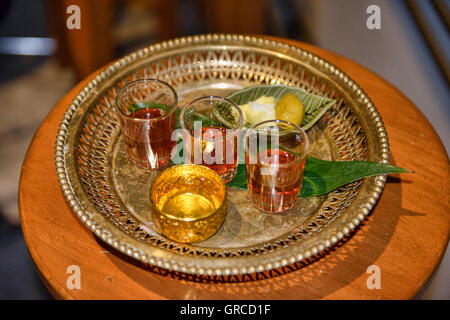 Fancy ya dong Thai white spirits with herbs at a bar in Bangkok ...