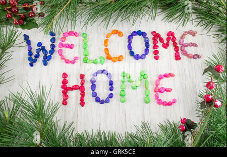 Welcome home note written with small colorful rocks Stock Photo - Alamy