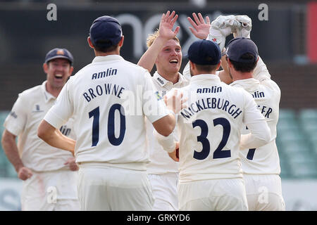 Jamie Porter of Essex celebrates with his team mates after taking the ...