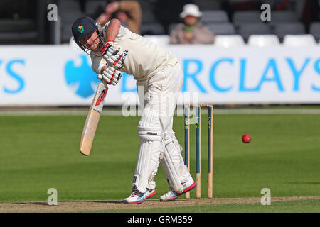 Chris Cooke in batting action for Glamorgan as James Foster looks on ...