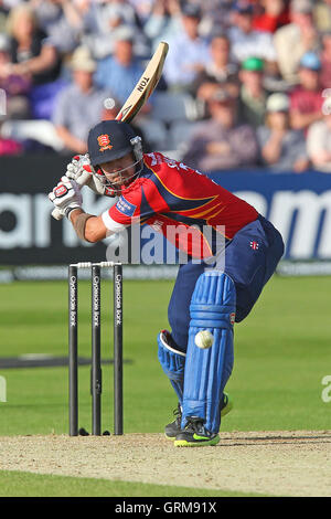 Owais Shah in batting hits six runs for Essex as Andrew Hodd looks on ...