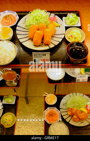 Japanese restaurant displaying dishes of traditional Asian food in ...