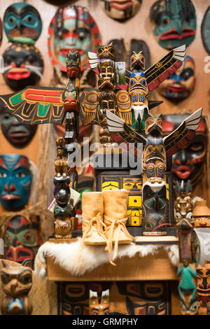 Visitors walk along souvenir stores at the Qianmen shopping street with ...