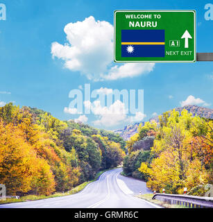 Nauru road sign against clear blue sky Stock Photo - Alamy