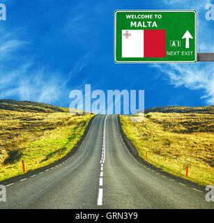 MALTA road sign against clear blue sky Stock Photo - Alamy
