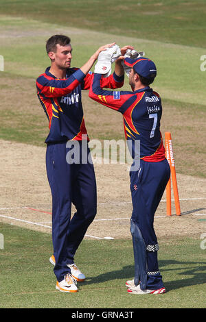 Reece Topley (R) of Essex Eagles congratulates Graham Napier on taking ...
