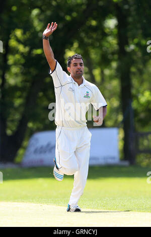Zain Shahzad of Wanstead celebrates the first Chingford wicket ...