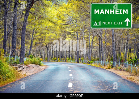 MANHEIM road sign against clear blue sky Stock Photo - Alamy