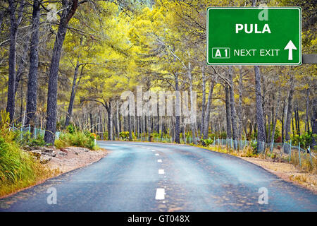 PULA road sign against clear blue sky Stock Photo - Alamy