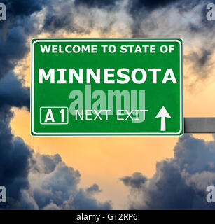 Welcome To Minnesota Green Road Sign Over Blue Sky with Some Clouds ...