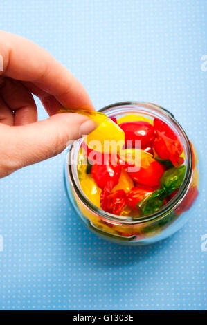 Hand picking sweets Stock Photo - Alamy