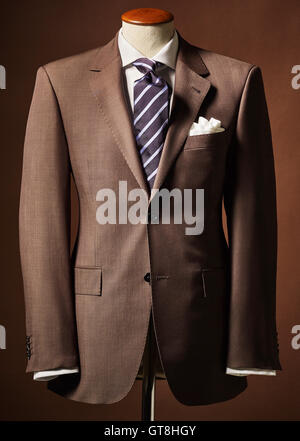 Stylish necktie on brown background Stock Photo - Alamy
