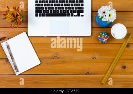Tidy clean office desk with laptop computer takeaway coffee ...
