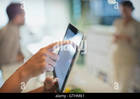 Finger touching tablet with business connection concept Stock Photo - Alamy