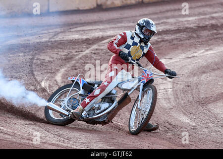 Hackney speedway legend Barry Thomas leads out the Hawks on the parade ...