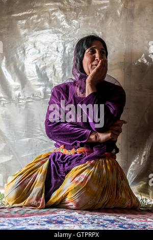 Khoram Gol, nomadic Basseri woman in her family's tent. The Basseri are ...