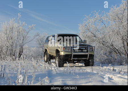 Great Wall Deer pickup driving on snowy river beach Stock Photo - Alamy