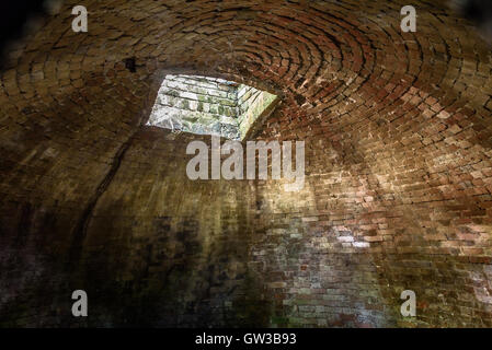 Old brick ice storage house built underground Stock Photo - Alamy