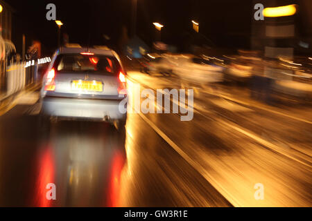 Car breaking suddenly in the wet Stock Photo - Alamy
