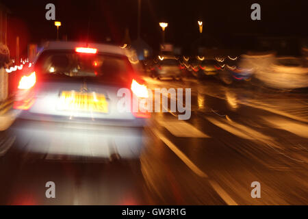 Car breaking suddenly in the wet Stock Photo - Alamy