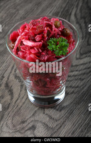 Viniagrette russian salad served parsley on wood background Stock Photo ...