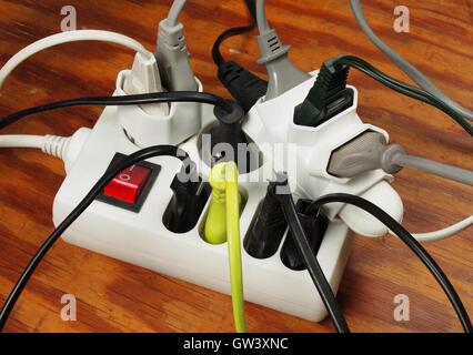 Overloaded extension cord Stock Photo - Alamy