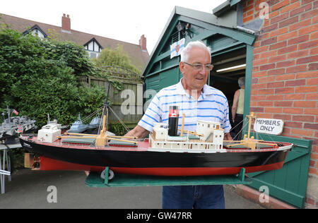 A member of the Tynemouth Model Boat Club sails his model boat at the ...