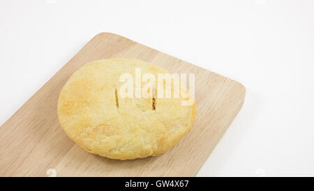 The Taiwanese sun cake (milk butter pastry) on the brown wooden plank ...